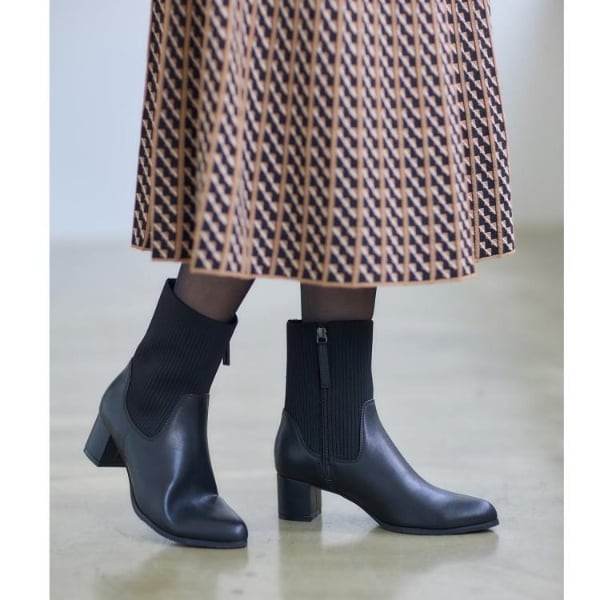 リフレクト（Reflect）/【足元すっきり見え／ファスナー開き】リブ編みニットブーツ
