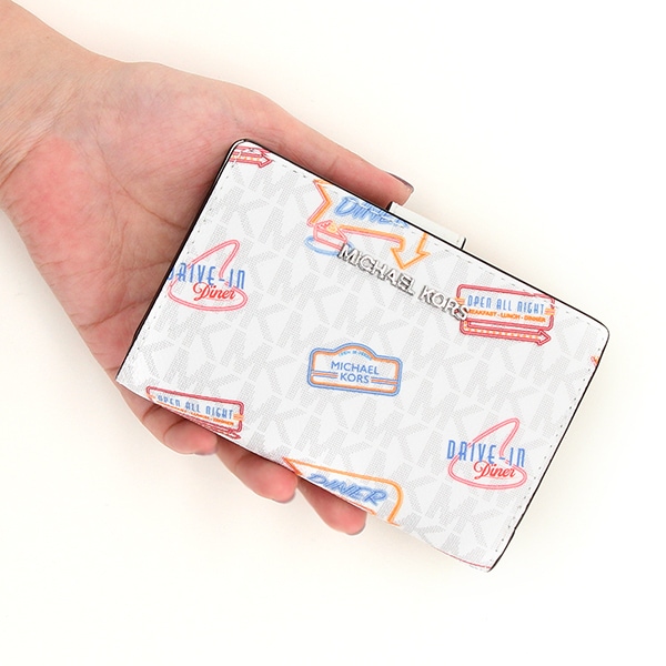 マイケル・コース（Michael Kors）/JET SET TRAVEL ビルフォールド ジップ コンパクトウォレット ミディアム