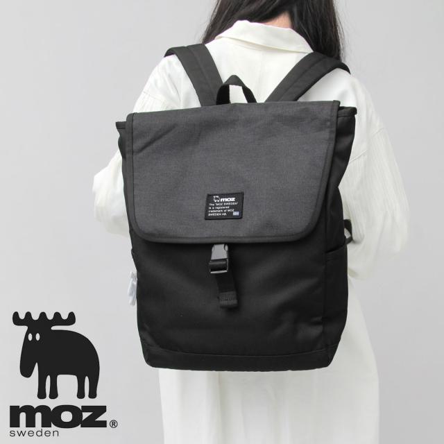 モズ（moz）/フラップ バックパック リュック マザーズバッグ 通勤 通学 A4収納 リフレクトチャーム付き