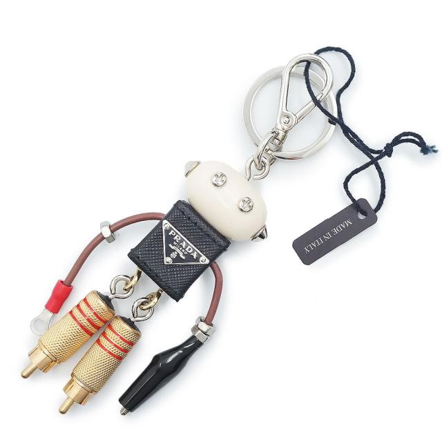 （未使用　展示品）プラダ PRADA トリック ロボット エドワード トライアングル 三角ロゴプレート バッグチャーム キーリング キーホルダー サフィアノ サフィアーノ カーフレザー ネロ ブラック ホワイト ゴールド シルバー金具 1TR097 箱付