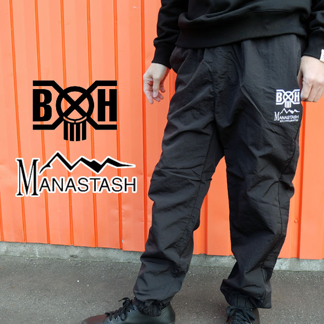 送料無料 ボトムス トラックパンツ メンズ AW 秋冬 新作 秋新作 冬新作 人気 流行 定番 2026 マナスタッシュ MANASTASH 792-5210012 010 バウンティーハンター コラボモデル 長ズボン 防寒 キャンプ アウトドア アパレル ウェア ブラック 黒 服