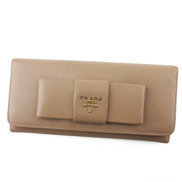 【BIGお買い物ラリー★30%OFFセール中】プラダ PRADA 長財布リボン フィオッコ ベージュ ゴールド レディース 中古