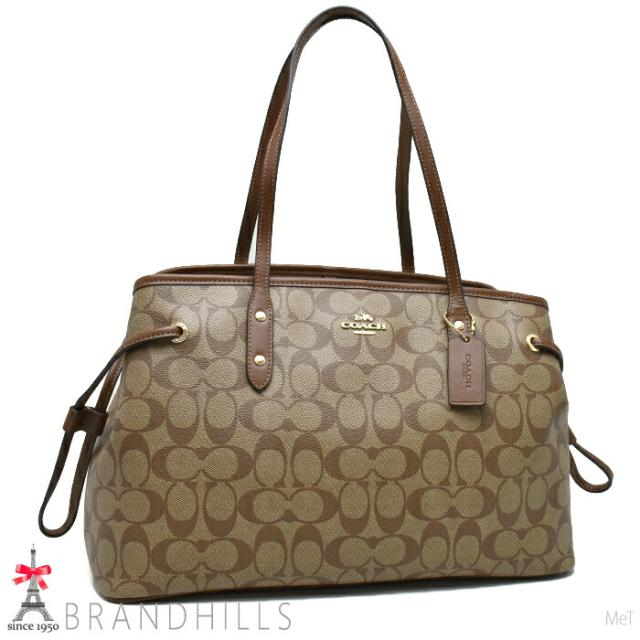 コーチ トートバッグ シグネチャー PVC レザー カーキ サドル ドローストリング キャリーオール F57842 COACH 未使用品 【中古】
