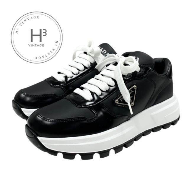 プラダ PRADA スニーカー 靴 シューズ レザー ブラック ホワイト 黒 未使用 トライアングル ロゴ