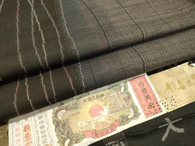 平和屋着物●都喜ヱ門　本場大島紬　9マルキ　古代染色純泥染　時計をみないで　藤絹織物謹製　証紙付き　正絹　逸品　未使用　DAAU0563tw