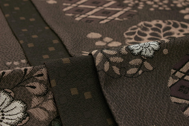 未仕立て】袋帯 こげ茶色 ダークブラウン 雪輪 鉄線花 葵 辻ヶ花